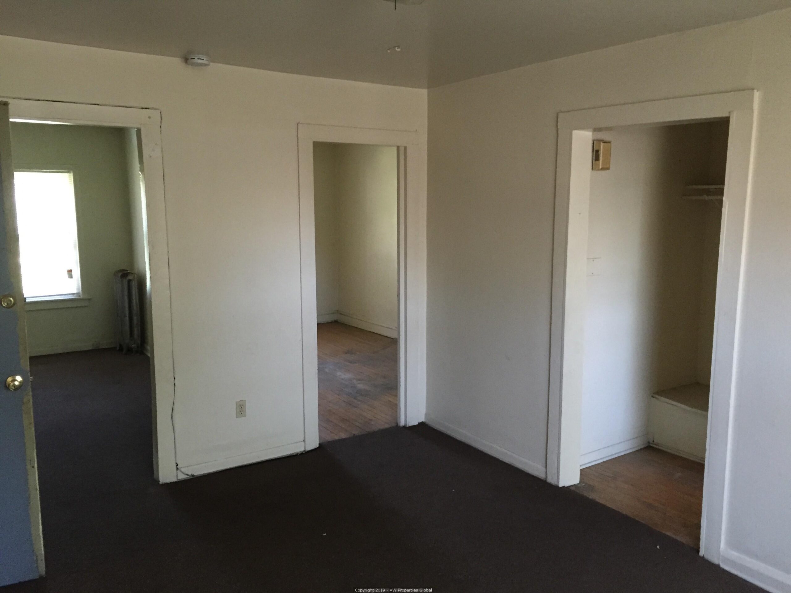 BANK OWNED: 24 Unit Multi-Family Building - AuctionWorks